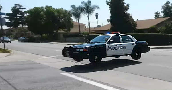 Two Police Cars Do An Awesome Intersection Jump! - Muscle Cars Zone!